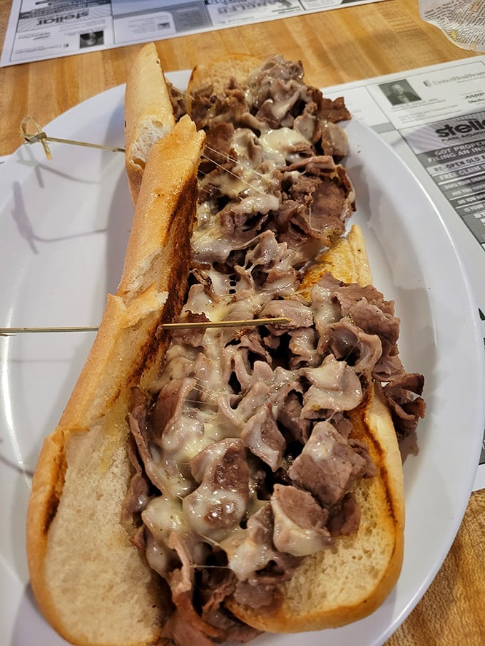 A sandwich so packed with tender meat and melty cheese that it requires structural support. Engineering and deliciousness in perfect harmony.