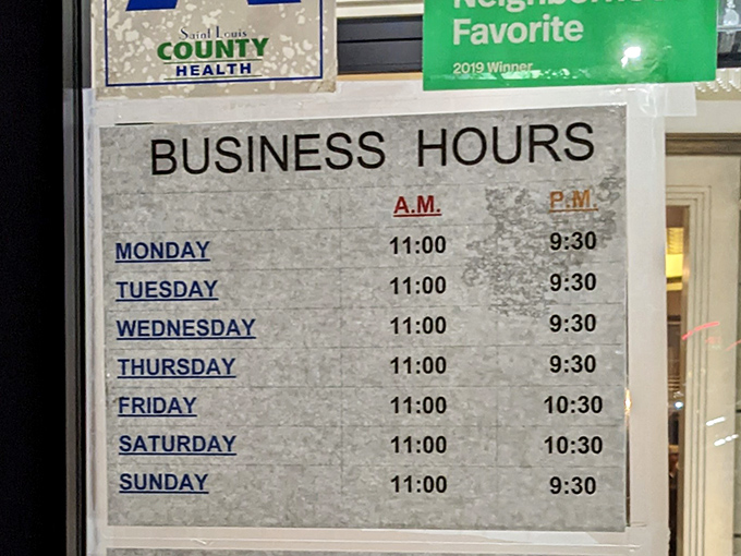 Business hours posted like a treasure map &ndash; X marks the spot where hunger meets satisfaction seven days a week.