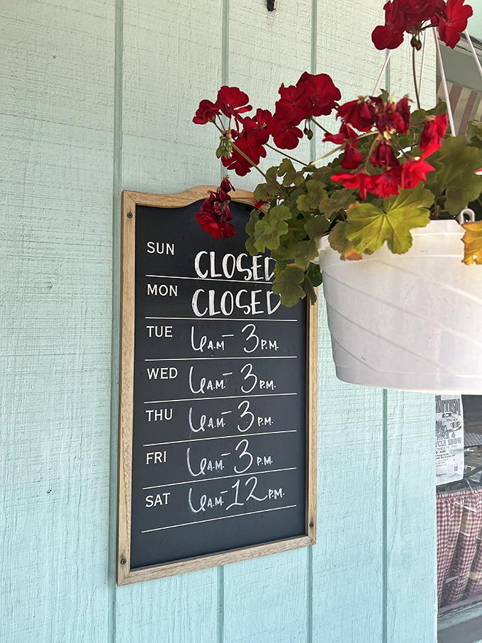 The hours board tells you when to come, but not how long you'll linger. Saturday's early closing time is the universe telling you to save room for lunch elsewhere.