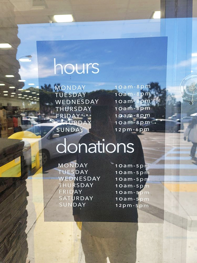 Store hours posted with the confidence of a place that knows you'll need plenty of time to explore every nook and cranny of thrift wonderland.