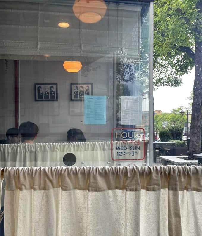 Those hours posted on the window (Wed-Sun, 12) might as well read "Times When Happiness Is Available" for pizza enthusiasts.