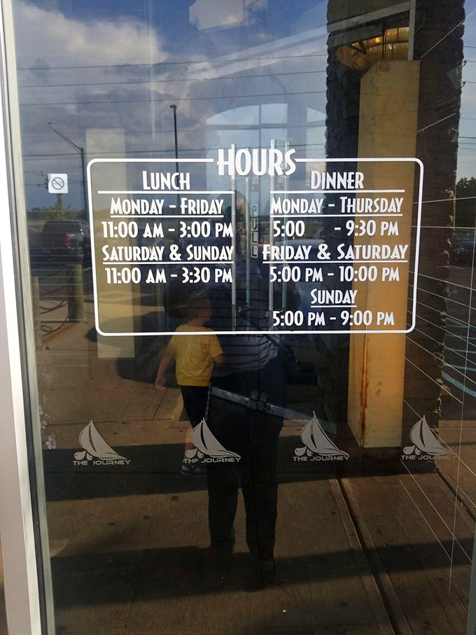 Operating hours posted clearly&mdash;because knowing when you can get your next crab leg fix is essential information for serious buffet enthusiasts.