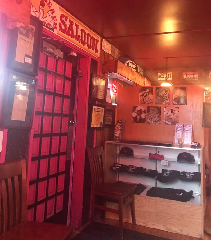 Red door, wooden walls, and merch that lets you take a piece of Szabo's home when your stomach can't fit another bite.