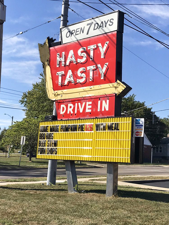 The roadside sign promises homemade pumpkin pie—a commitment to seasonal goodness that chain restaurants can only dream about.