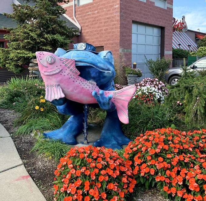 This whimsical fish sculpture outside welcomes seafood lovers with a smile, setting the tone for the playful experience within.