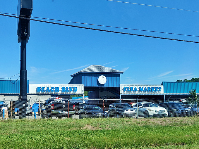 The blue and white exterior of Beach Boulevard Flea Market stands as a retail landmark in Jacksonville, beckoning bargain hunters from miles around.