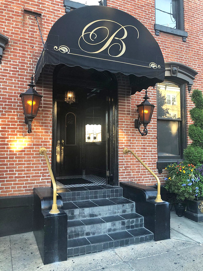 The iconic black awning with its elegant "B" monogram signals you've arrived somewhere special. First impressions matter, and this one's stellar.