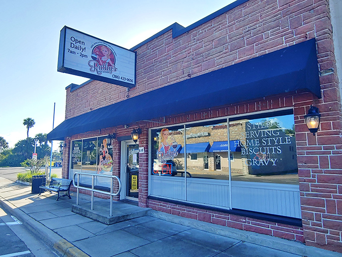 The storefront proudly advertising "home style biscuits & gravy"&mdash;words that have caused many a car to make sudden, unplanned turns into the parking lot.