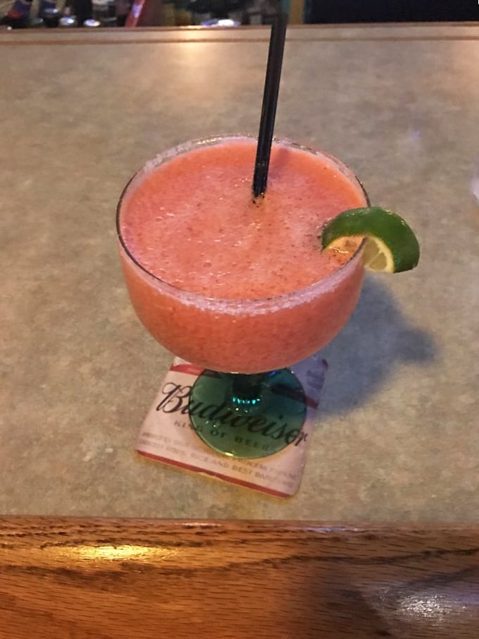 This strawberry margarita isn't just a drink&mdash;it's Florida sunshine in a glass with a lime wedge winking at you from the rim.