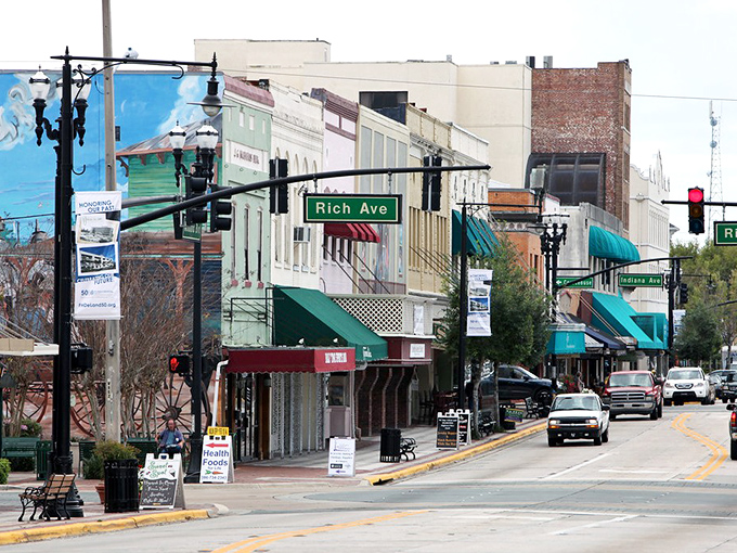 Rich Avenue showcases DeLand's colorful storefronts and awning-shaded sidewalks. Small-town shopping with big-city variety.