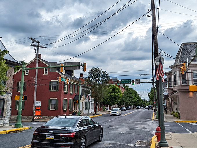 Rain-slicked streets reflect Lititz's colorful historic buildings, creating a double vision of charm that even gray skies can't diminish.