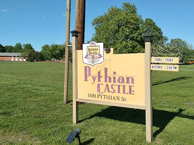 The unassuming street sign belies the extraordinary experience waiting beyond, like finding Hogwarts tucked behind an ordinary London pub.