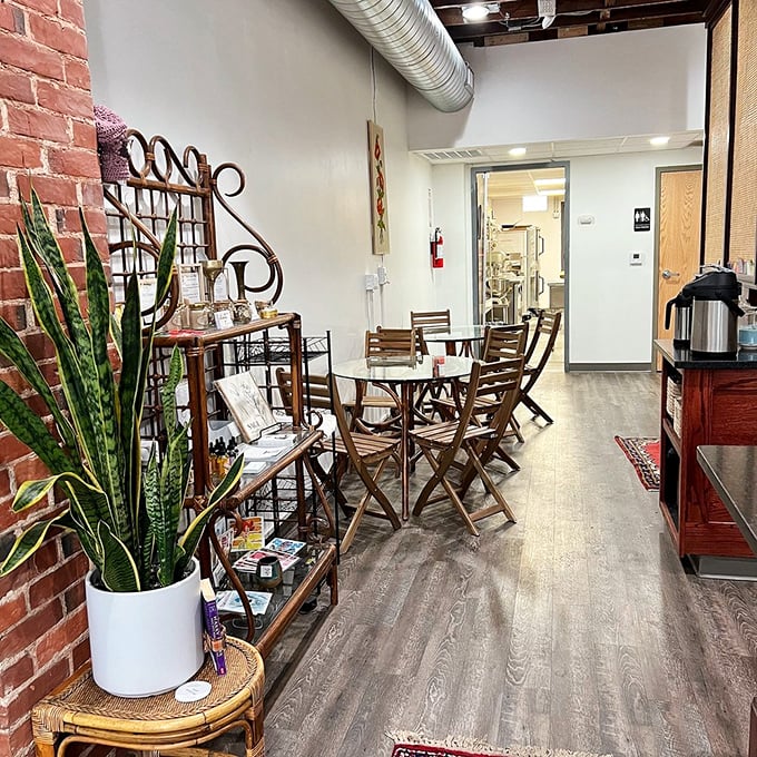 Exposed brick, wooden chairs, and enough plants to improve your oxygen intake while you improve your day with pastry.