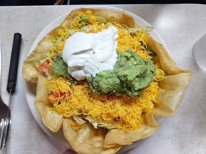 This taco salad bowl doesn't just hold ingredients &ndash; it cradles them in a crispy shell throne topped with a crown of sour cream.