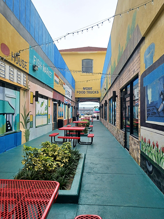 Pastel paradise! This colorful corridor leads to more food options, proving that even the paths between purchases can be Instagram-worthy.