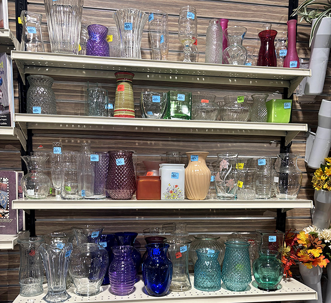 Glassware in every color of the rainbow stands ready to brighten someone's kitchen. That cobalt blue vase is practically singing "take me home!"