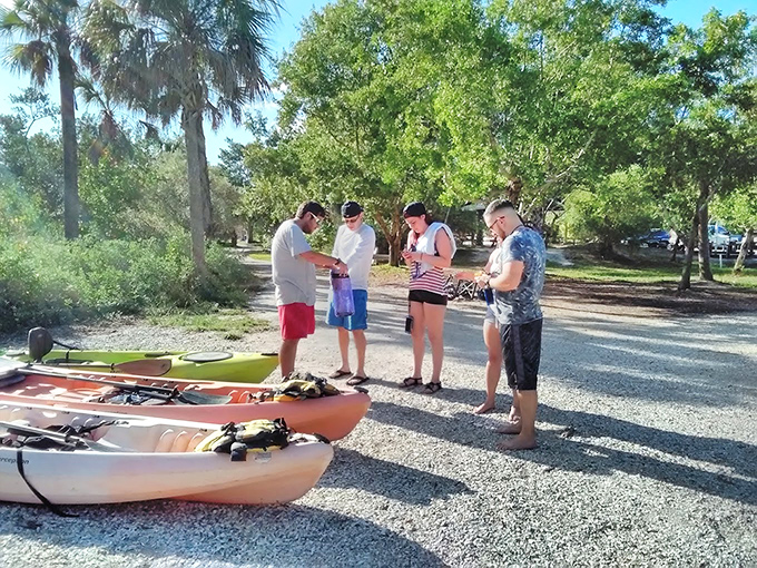 Fellow explorers navigate the green maze, each discovering their own piece of paradise.