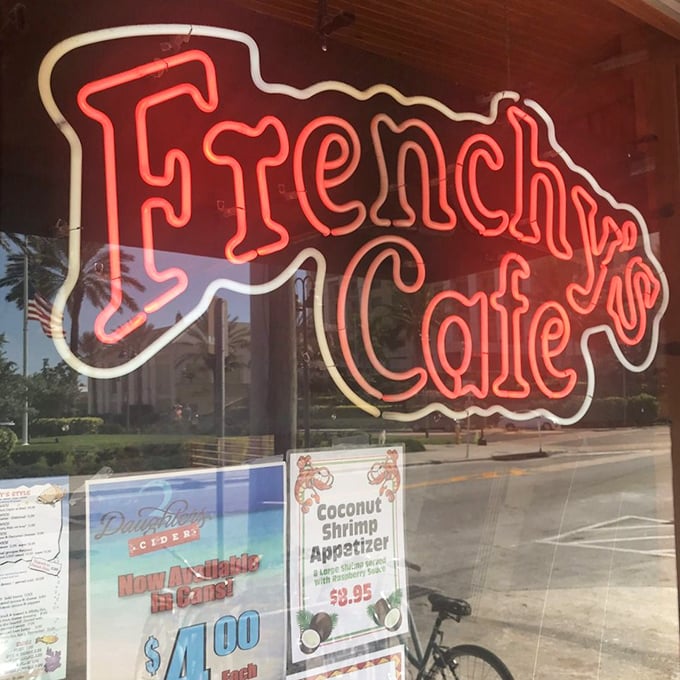 That neon sign has guided hungry seafood pilgrims for generations. Like a lighthouse for those navigating the treacherous waters of mediocre dining options.
