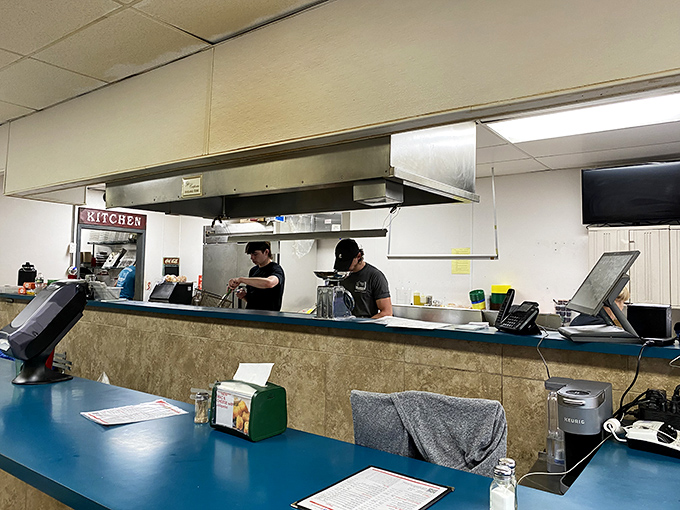 Where the magic happens&mdash;skilled hands working the grill with the precision of surgeons and the timing of jazz musicians. Sandwich artistry in motion.