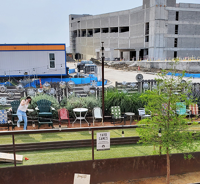 Yard games add another layer of fun to the experience. After toilet seat art, a round of cornhole seems perfectly normal.
