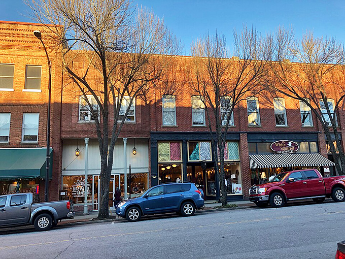 Bright colors and hanging plants make this sidewalk scene feel like a living postcard.