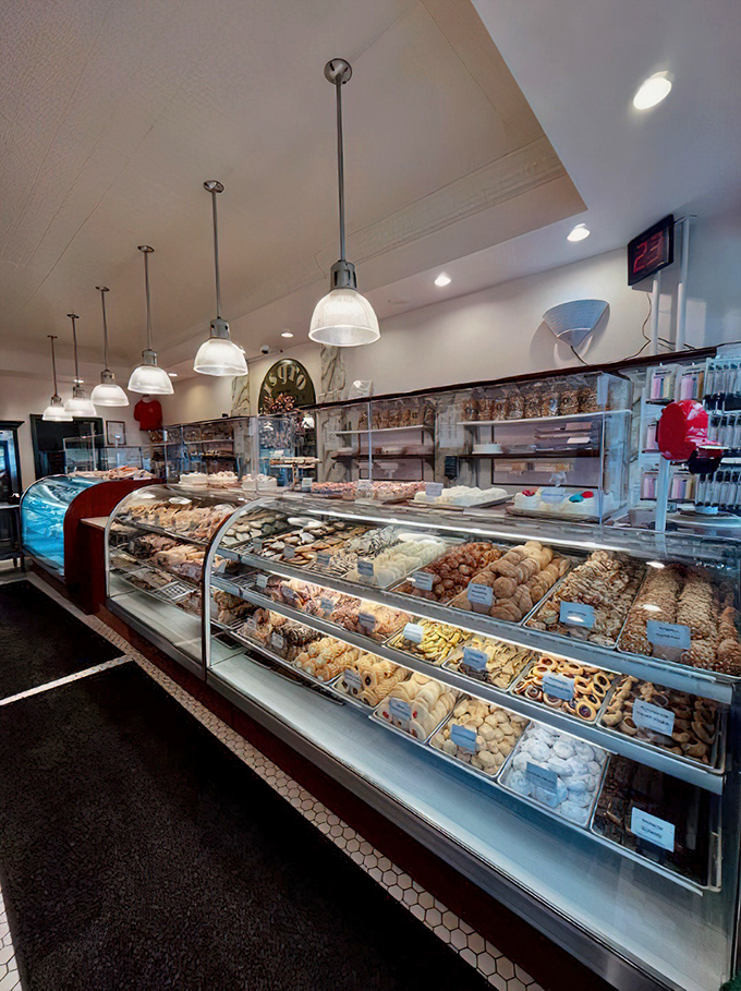 The wide-angle glory shot of display cases stretching into infinity - a panorama of possibilities that makes choosing just one item an act of heroism.