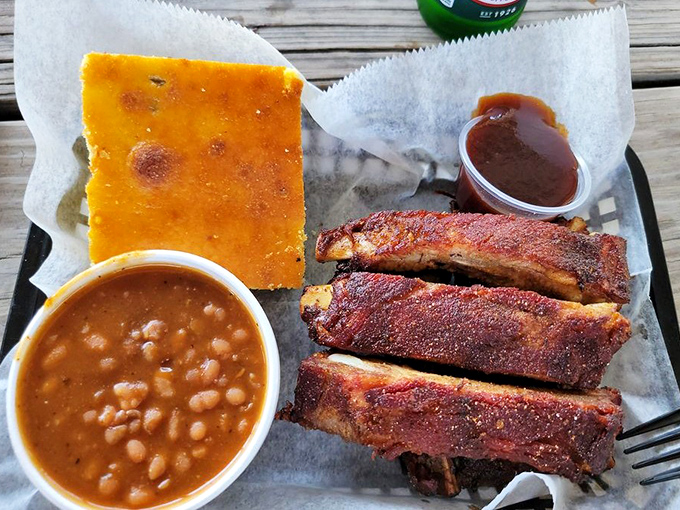 Six ribs that represent hours of patient smoking, ready to reward your good judgment with unforgettable flavor.