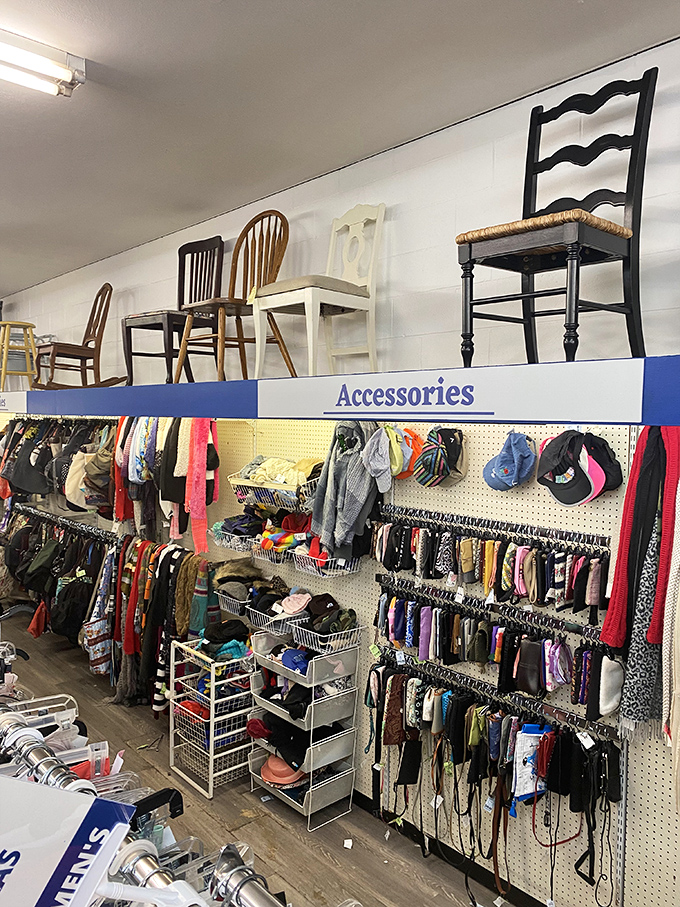 The accessories wall, where scarves, hats, and handbags create a textile rainbow that would make any fashionista's heart skip a beat.