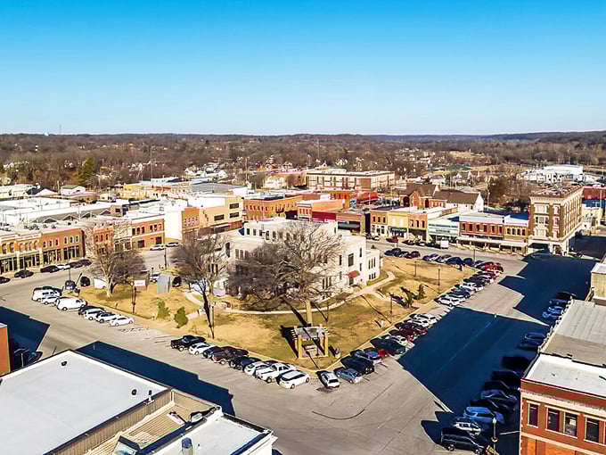 From above, Neosho's courthouse square design reveals itself as the heart of this affordable community, where retirees find both connection and value.