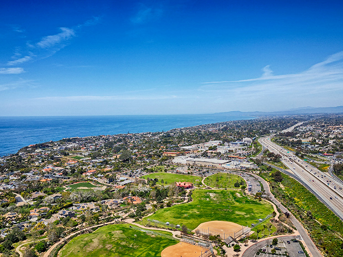 From above, Encinitas reveals itself as a perfect patchwork of greens and blues, where golf courses and ocean compete for the title of "most relaxing view."