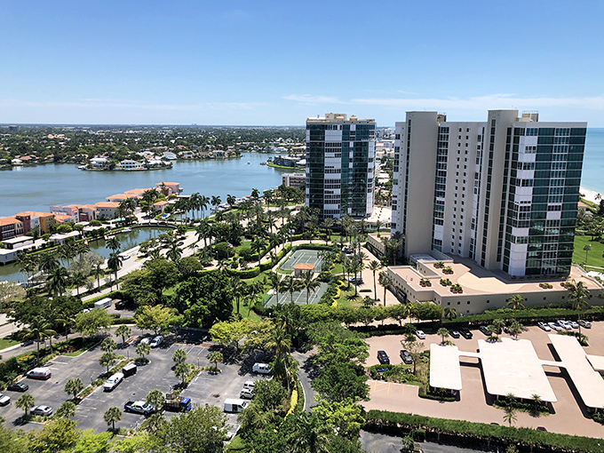 Naples from above reveals a perfect marriage of blue waters, lush greenery, and architecture that makes your hometown look like it's not even trying.