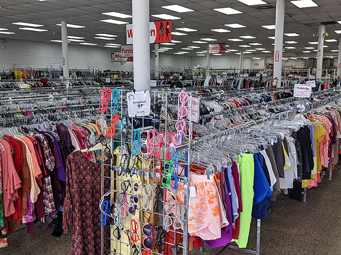 Endless racks of color-coded clothing create a retail rainbow, where patience and persistence lead to the perfect find.