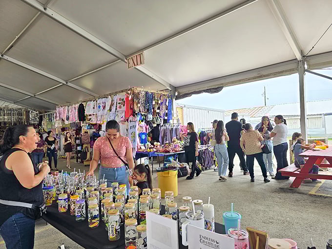 The weekend hustle in full swing! Shoppers navigate this covered marketplace, where every table offers new possibilities and potential treasures.