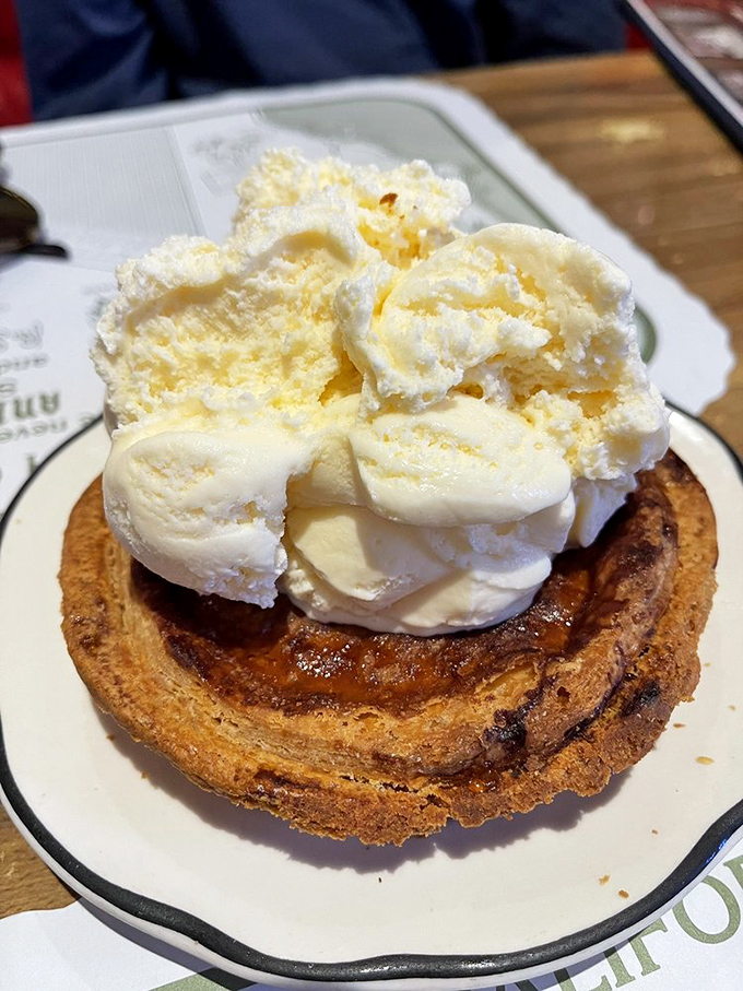 This warm apricot mini pie crowned with vanilla ice cream is the kind of dessert that makes you seriously consider ordering a second before you've finished the first.