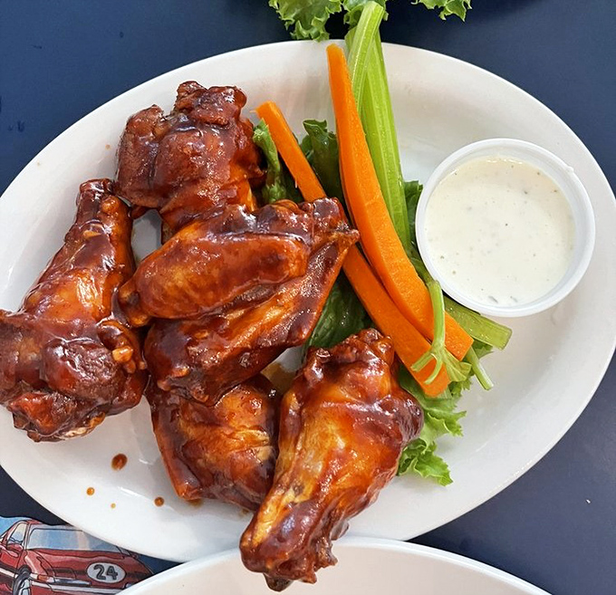 These wings aren't just glazed, they're ready for their close-up in the Comfort Food Hall of Fame.