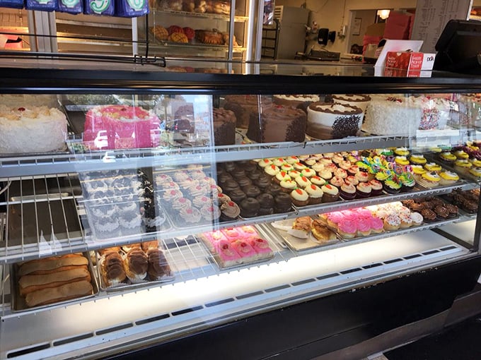 The display case that launches a thousand cravings&mdash;a kaleidoscope of frosted, glazed, and cream-filled treasures that makes choosing just one nearly impossible.