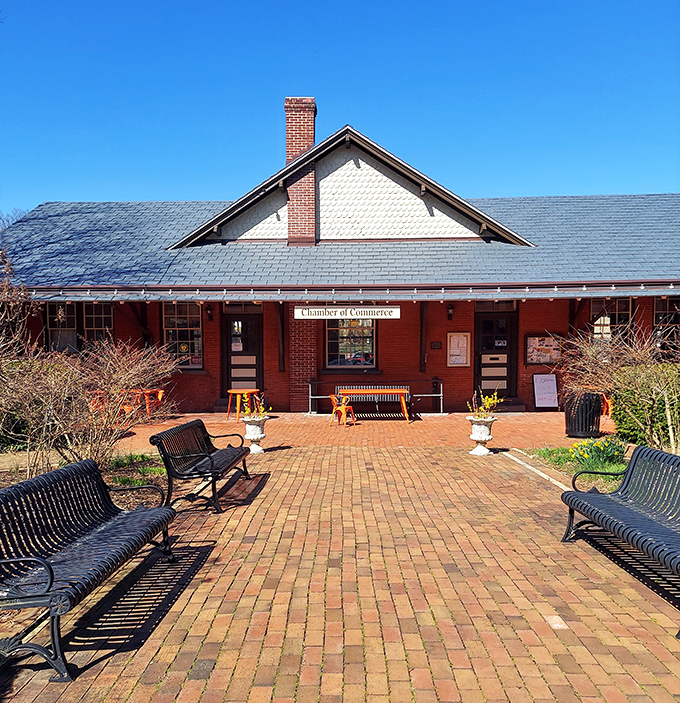 The Chamber of Commerce building welcomes visitors with brick-paved hospitality and benches that practically beg you to sit awhile.