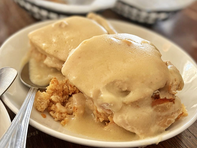 These biscuits and gravy represent the pinnacle of Southern breakfast engineering&mdash;fluffy clouds of dough swimming in creamy, peppery perfection.