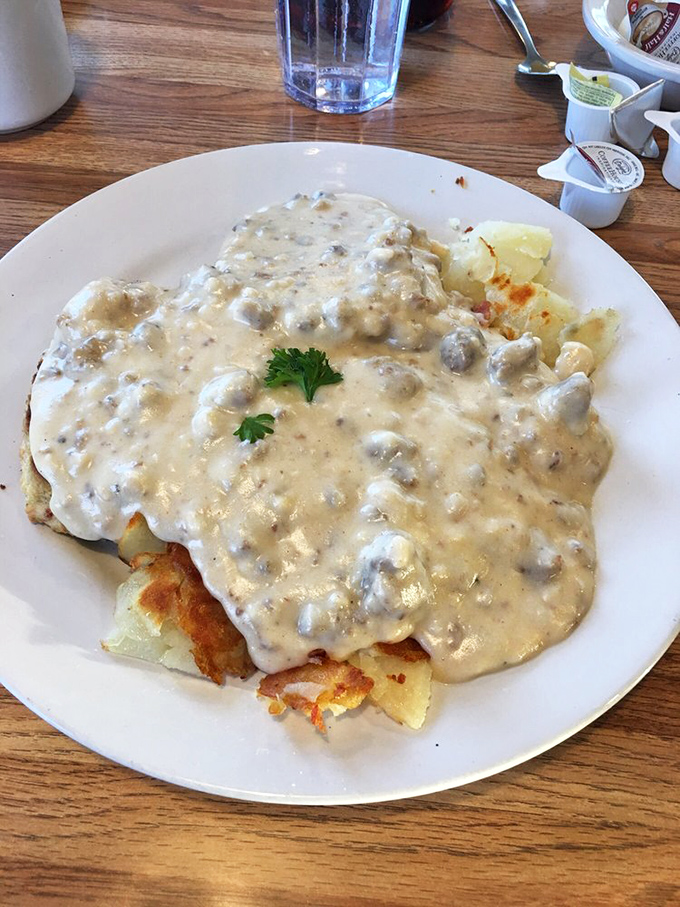 Biscuits and gravy that could make your grandmother both jealous and proud, blanketing potatoes in a peppery cream gravy hug.