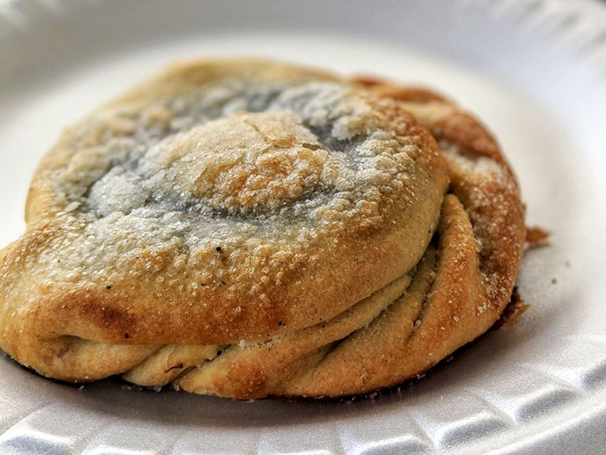 Blueberry filling peeks through the golden crust of this sweet pasty &ndash; Michigan's famous berries transformed into a portable dessert that would make any Yooper proud.