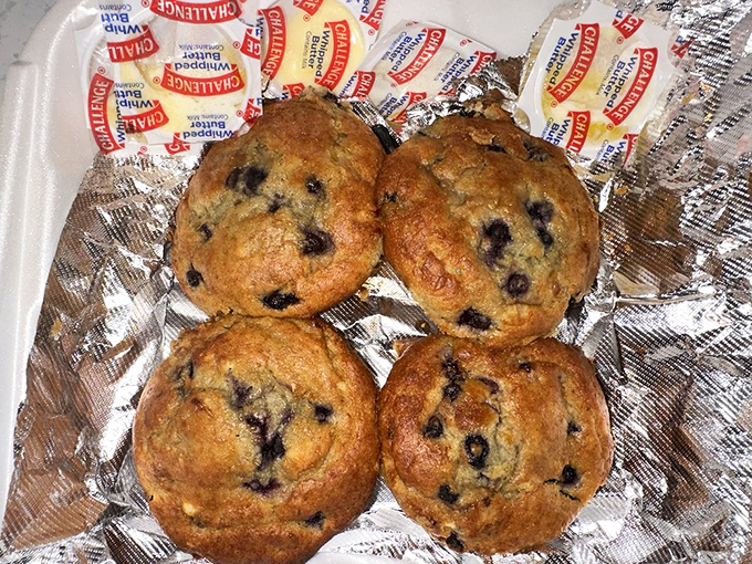 Blueberry cornbread muffins that bridge the gap between side dish and dessert. These little flavor bombs prove that BBQ joints can nail the details too.