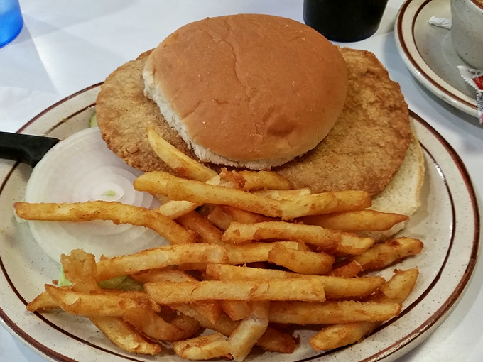 The breaded pork tenderloin sandwich&mdash;an Illinois classic that answers the eternal question: "What if the meat was three times bigger than the bun?"
