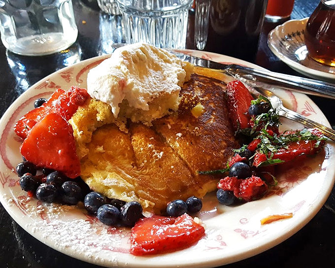 French toast that makes you question every other breakfast you've ever had. Berries, cream, and golden brioche create morning magic on a plate.