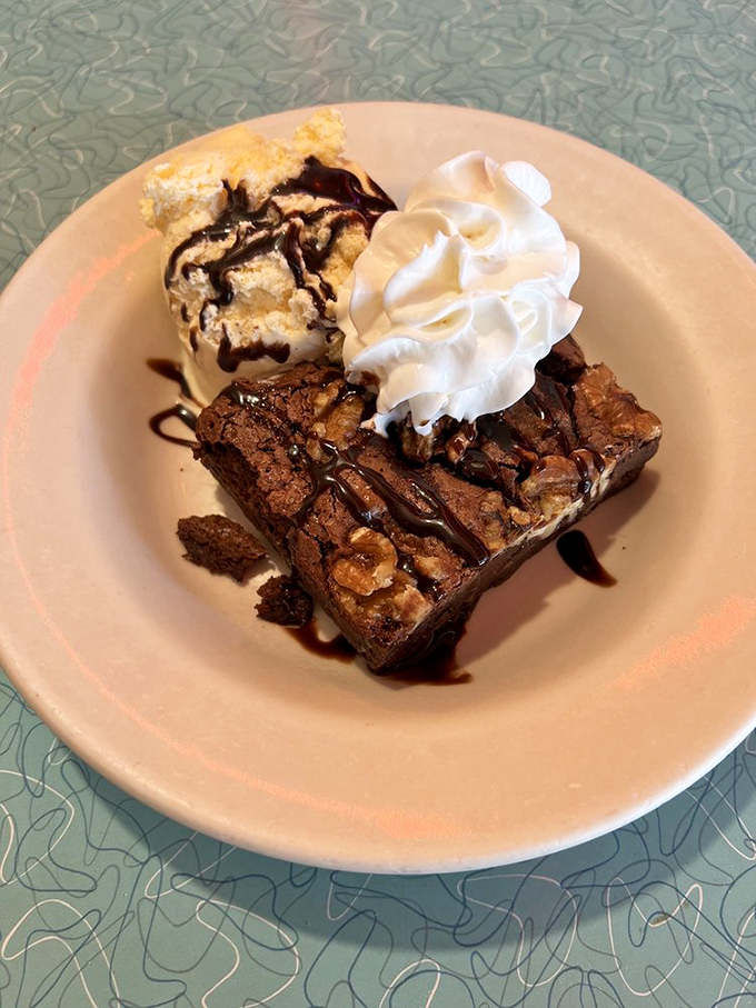 The perfect finale to any diner visit&mdash;a decadent brownie topped with ice cream and whipped cream proves Orphan Andy's knows how to end on a sweet note.