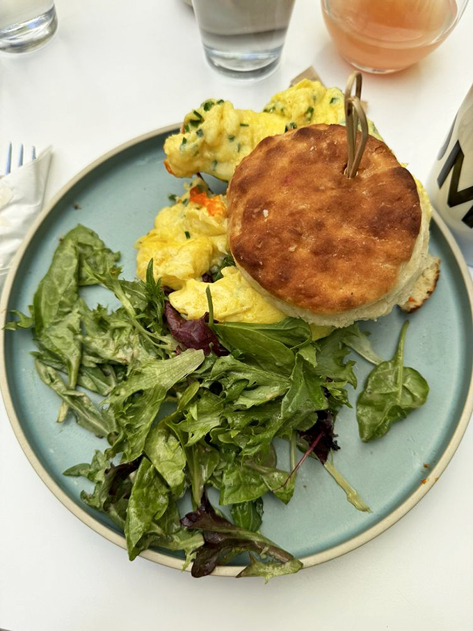 The buttermilk biscuit sandwich&mdash;where breakfast dreams come true between layers of flaky, buttery goodness. Worth every crumb.