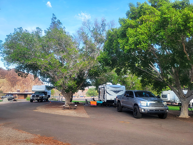 Camping nirvana: Where RVs nestle under shade trees and owners debate whether to hike, swim, or just stare at the view.