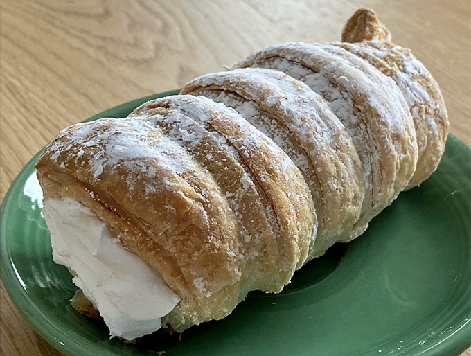 A tray of freshly filled cannoli waiting for their forever homes. Like adoption but caloric &ndash; these crispy tubes of joy won't be orphans for long. 