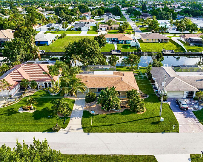 The Cape Coral area showcases waterfront living that makes lottery tickets seem like investments.