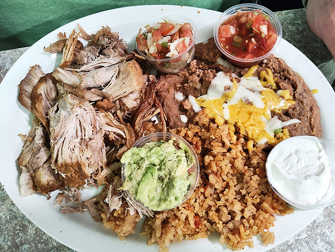 A carnitas plate that doesn't just feed your hunger but nourishes your soul. The kind of meal that makes you consider moving to Paradise permanently.