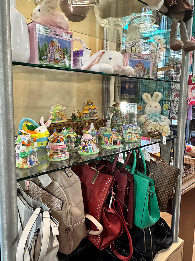 Seasonal treasures and designer handbags share space in this glass case &ndash; proof that Retique's inventory spans from practical to positively luxurious.